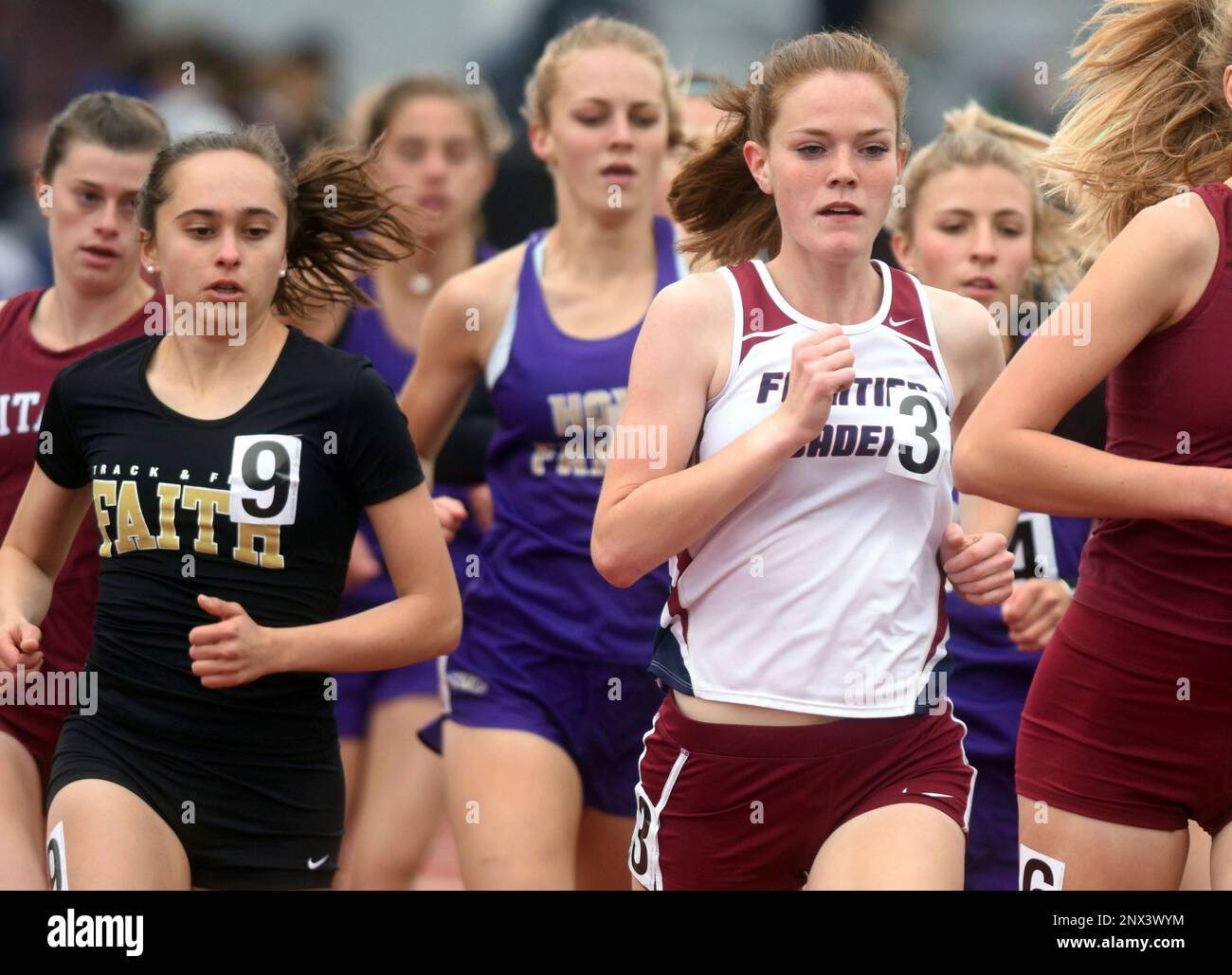 Frontier Academy's Hannah Ellis moves her way through the pack in the ...