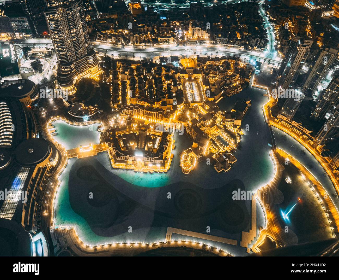 Aerial view of Downtown Dubai with roads, Dubai Mall and the fountain ...
