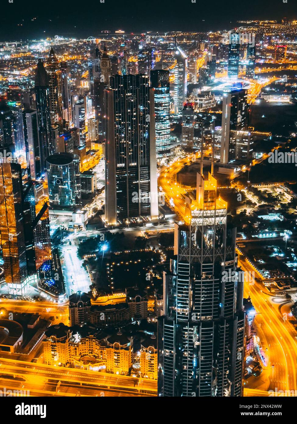 Aerial view of Downtown Dubai with roads, Dubai Mall and the fountain ...