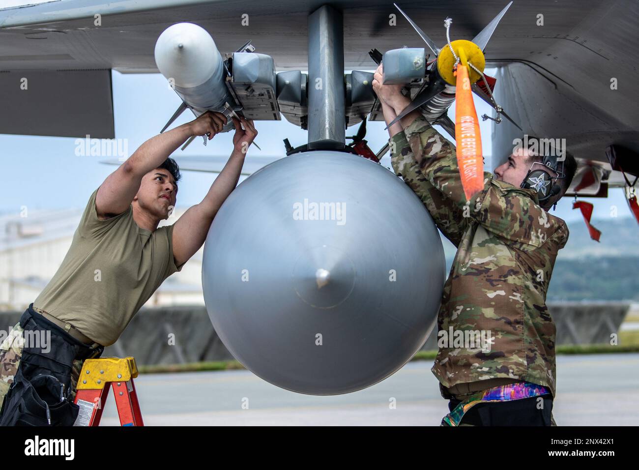 Senior Airman Kevin Arredondo, left, 44th Aircraft Maintenance Unit ...