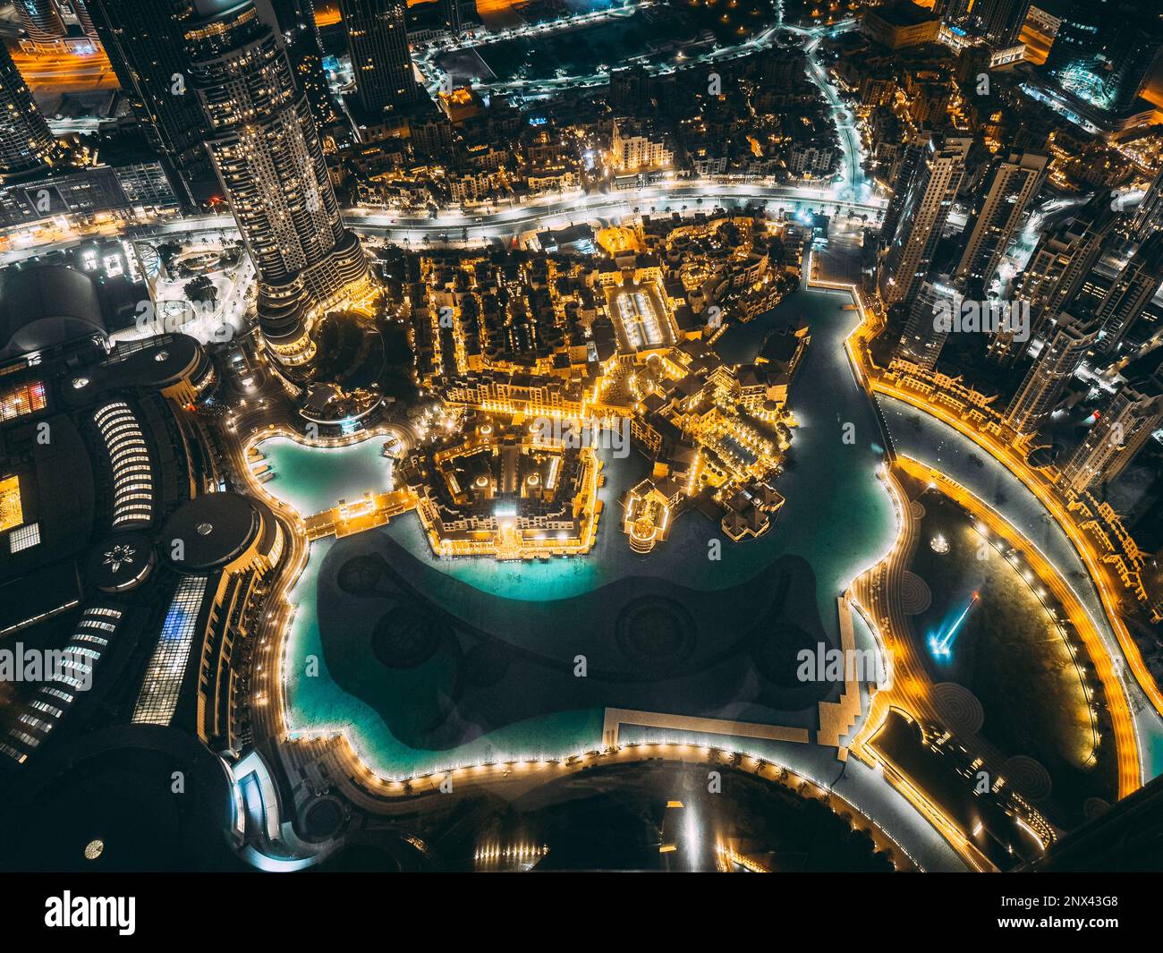 Aerial view of Downtown Dubai with roads, Dubai Mall and the fountain ...