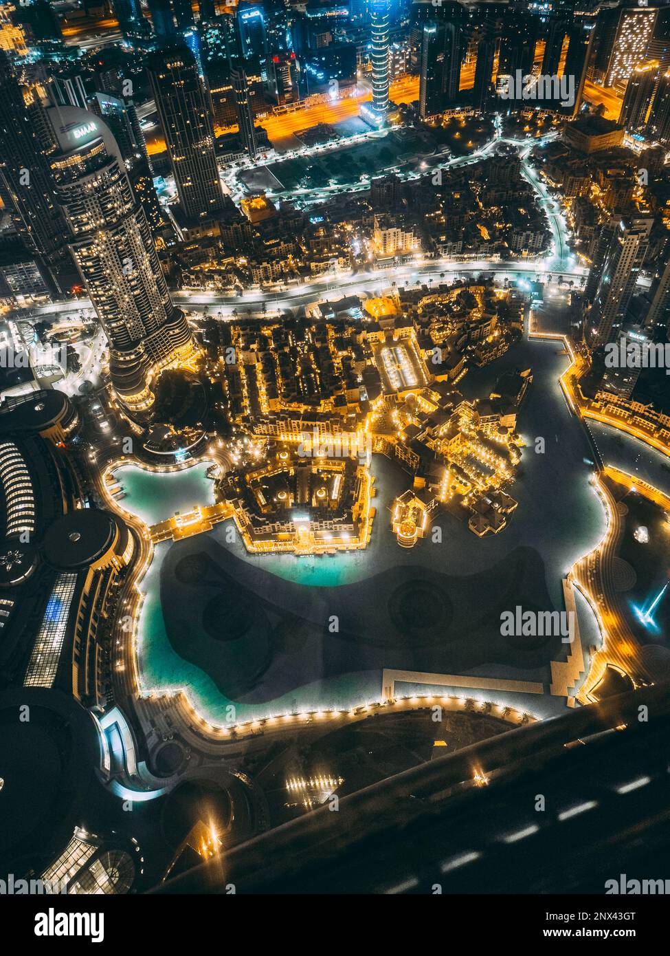 Aerial view of Downtown Dubai with roads, Dubai Mall and the fountain ...