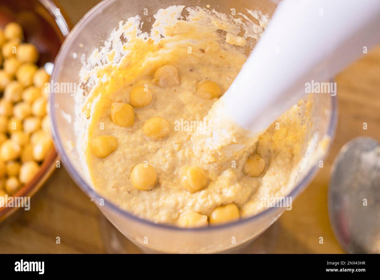 Hummus Ingredients, cooking hummus in a food processor, mixer Stock ...