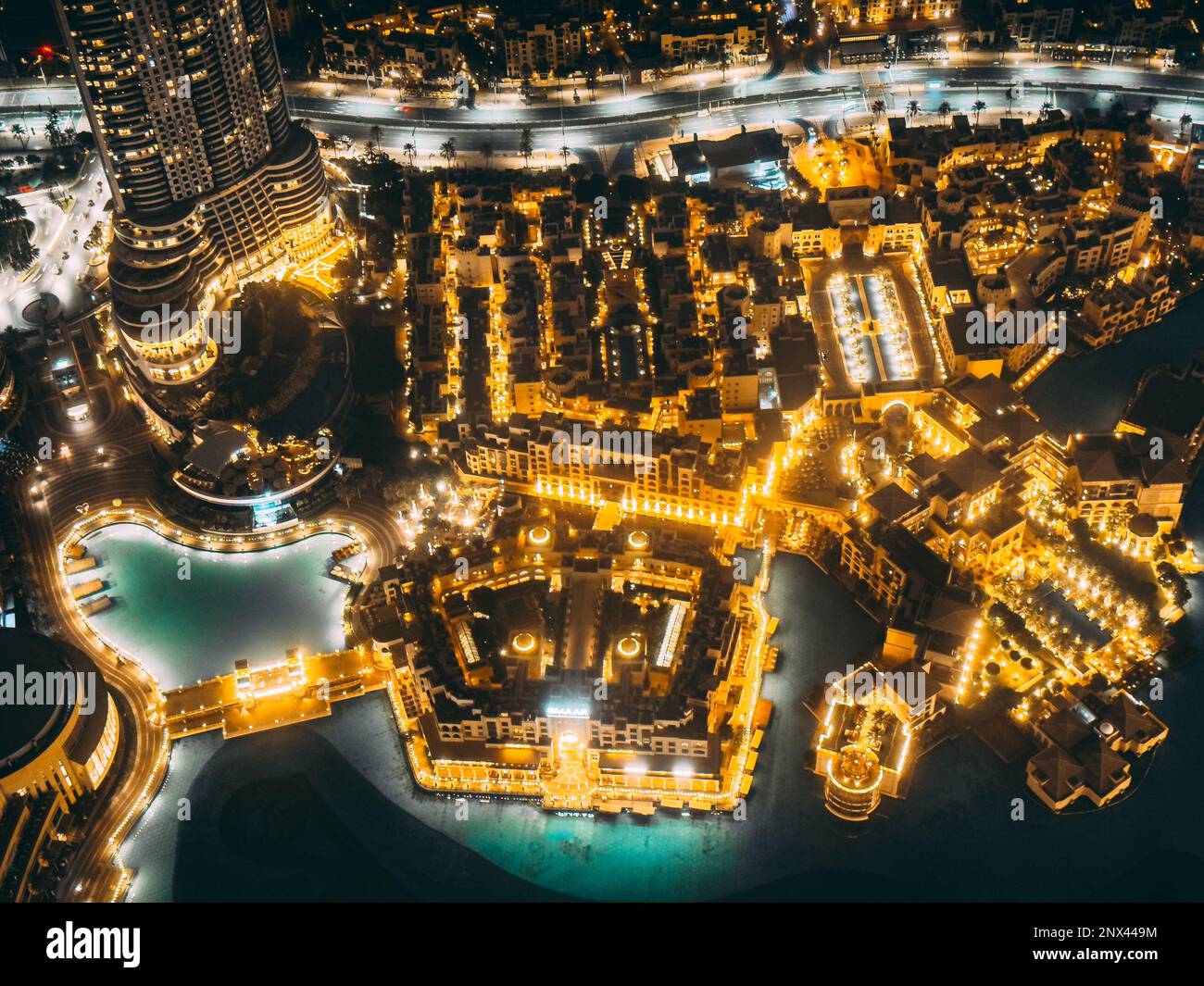 Aerial view of Downtown Dubai with roads, Dubai Mall and the fountain ...
