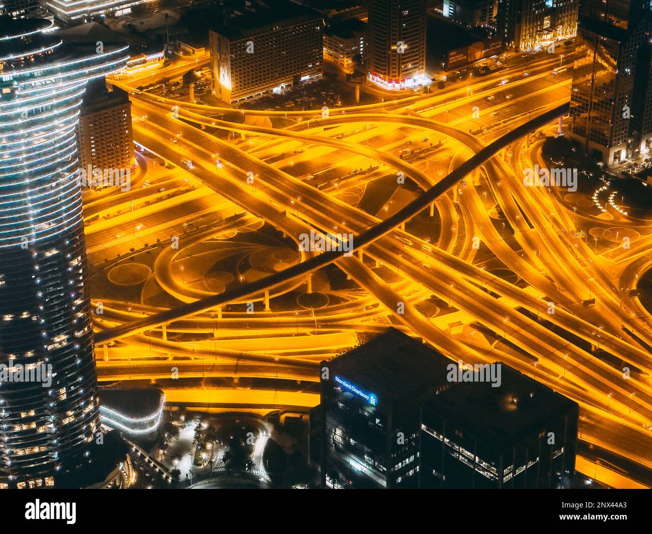 Aerial view of Downtown Dubai with roads, Dubai Mall and the fountain ...
