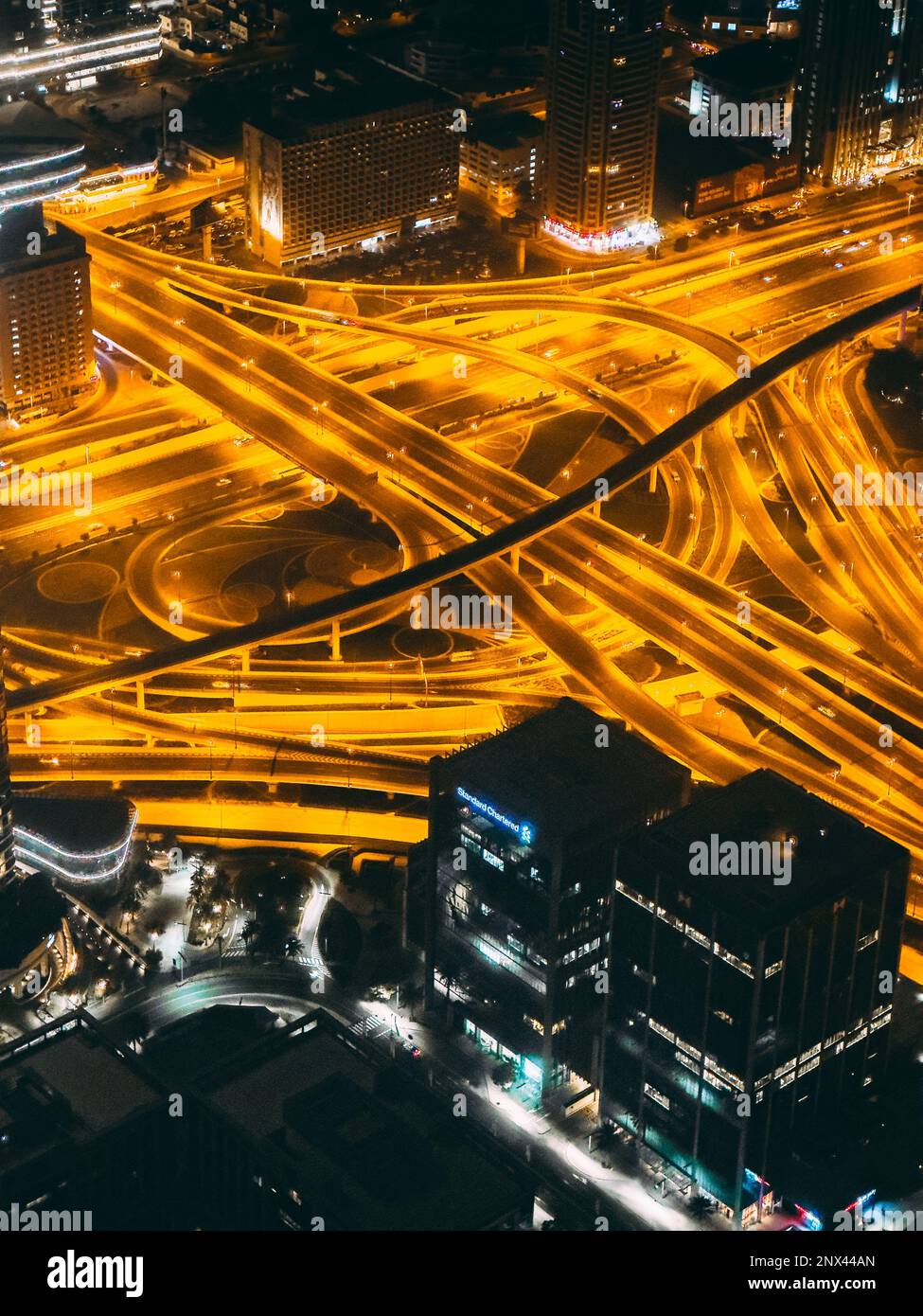 Aerial view of Downtown Dubai with roads, Dubai Mall and the fountain ...