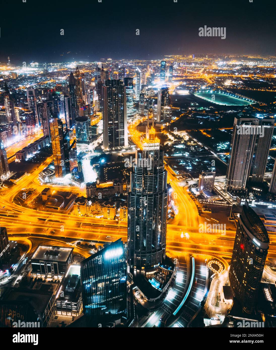 Aerial view of Downtown Dubai with roads, Dubai Mall and the fountain ...