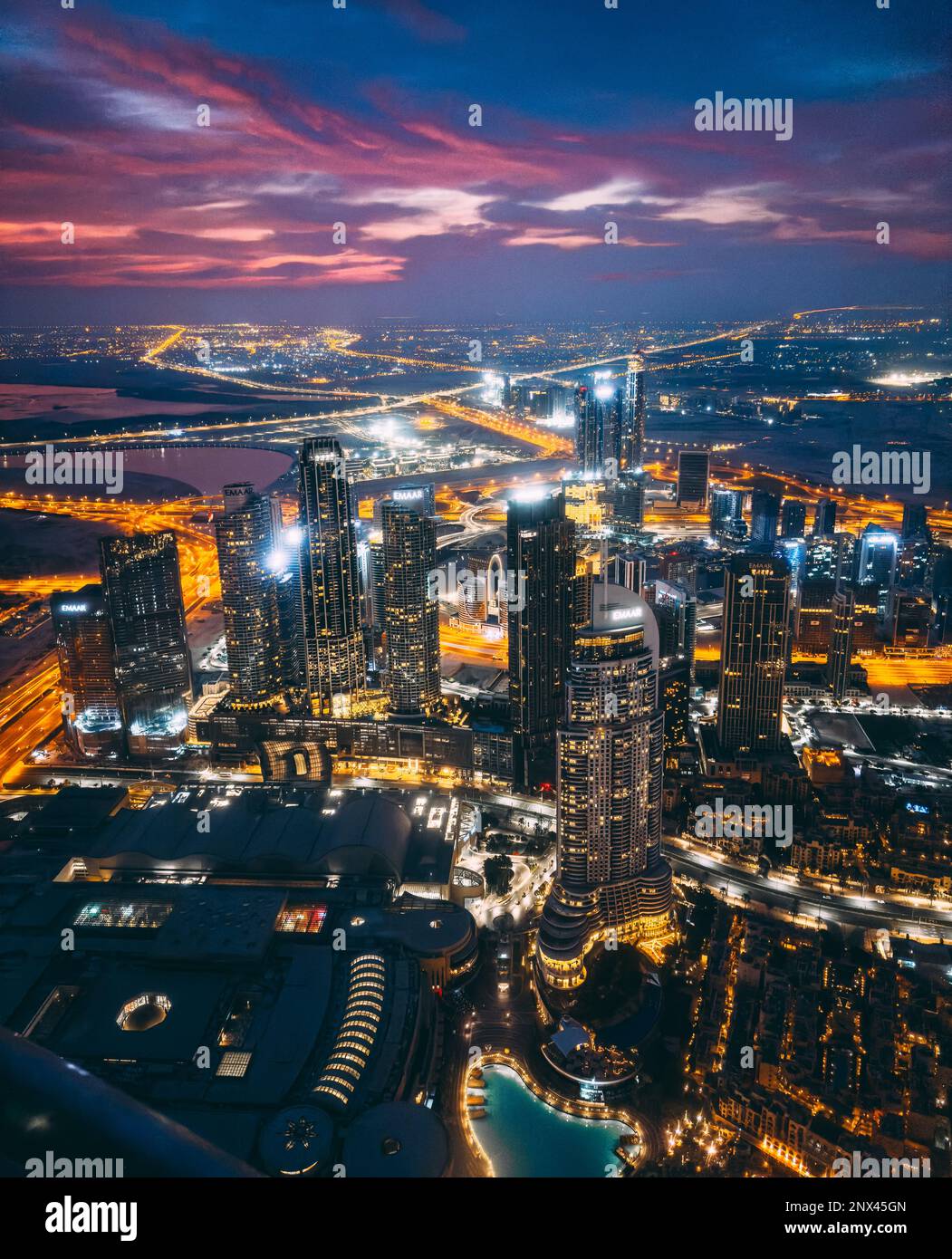 Aerial view of Downtown Dubai with roads, Dubai Mall and the fountain ...