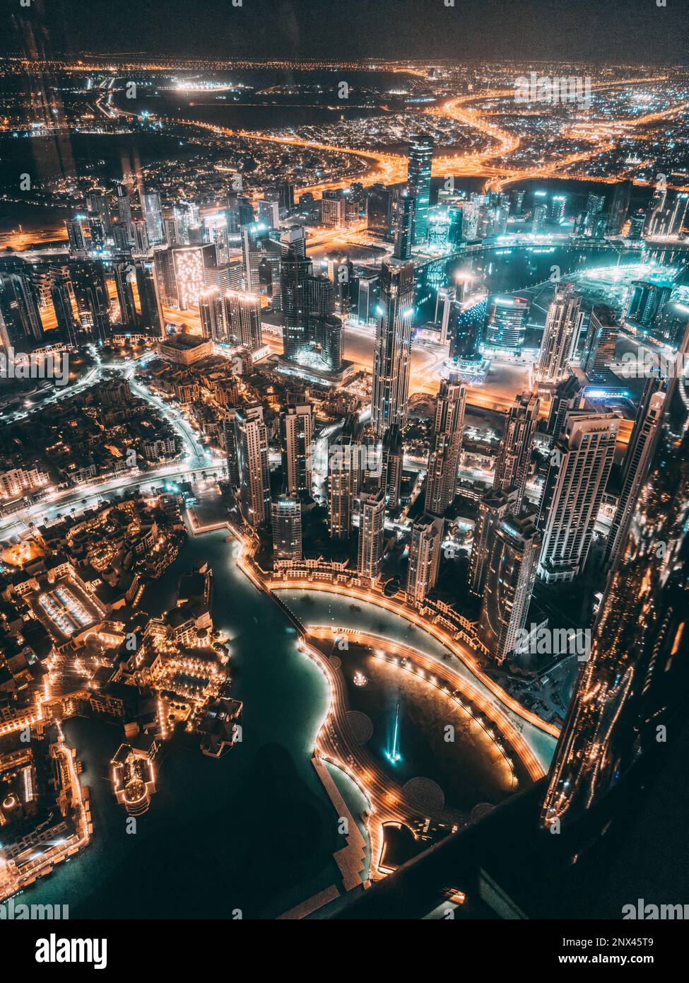 Aerial view of Downtown Dubai with roads, Dubai Mall and the fountain ...