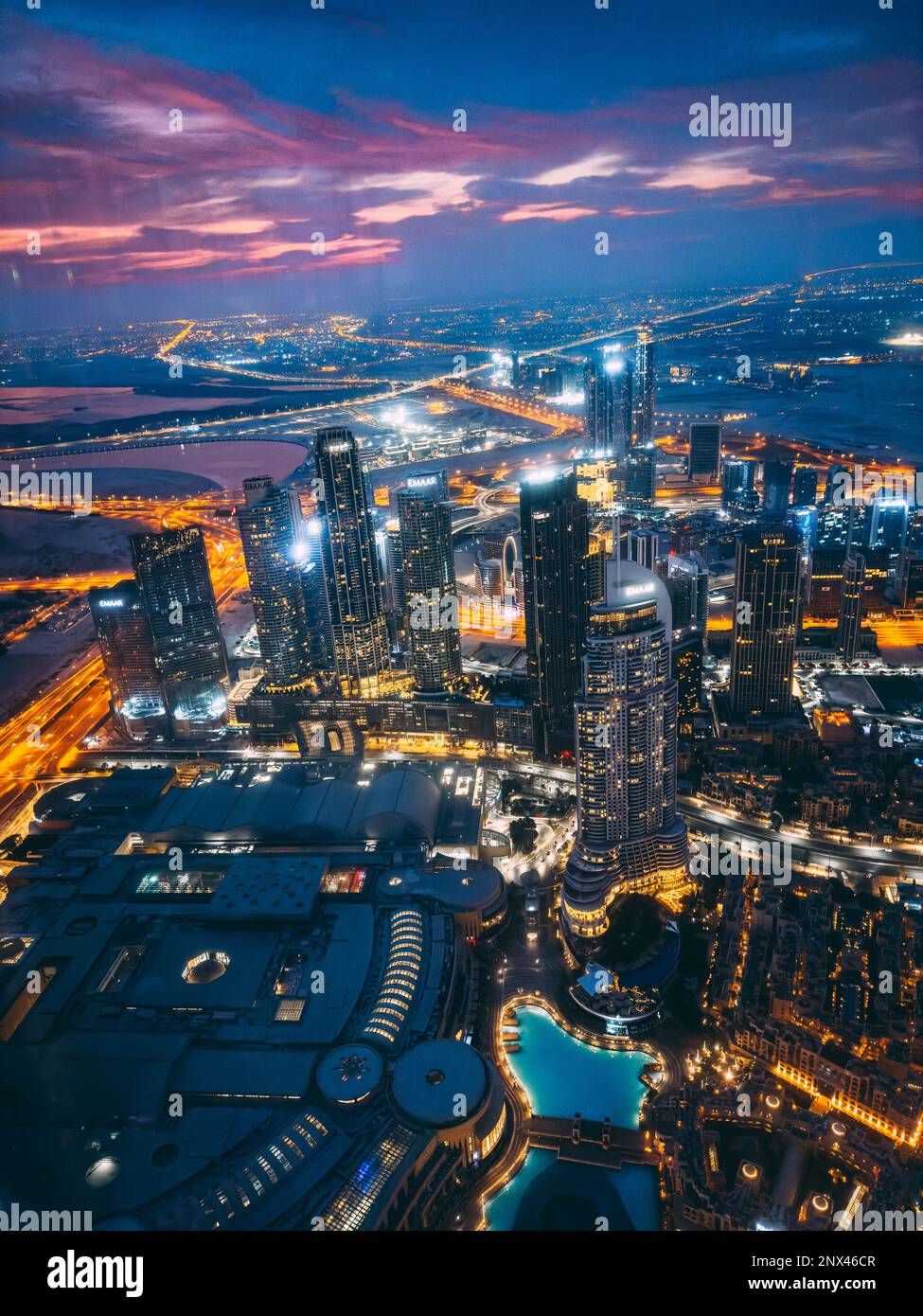 Aerial view of Downtown Dubai with roads, Dubai Mall and the fountain ...