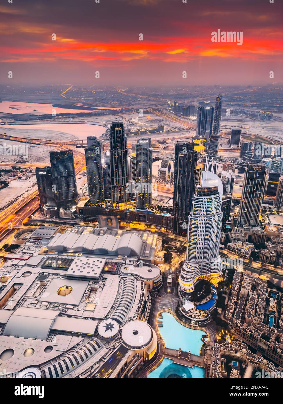 Aerial view of Downtown Dubai with roads, Dubai Mall and the fountain ...