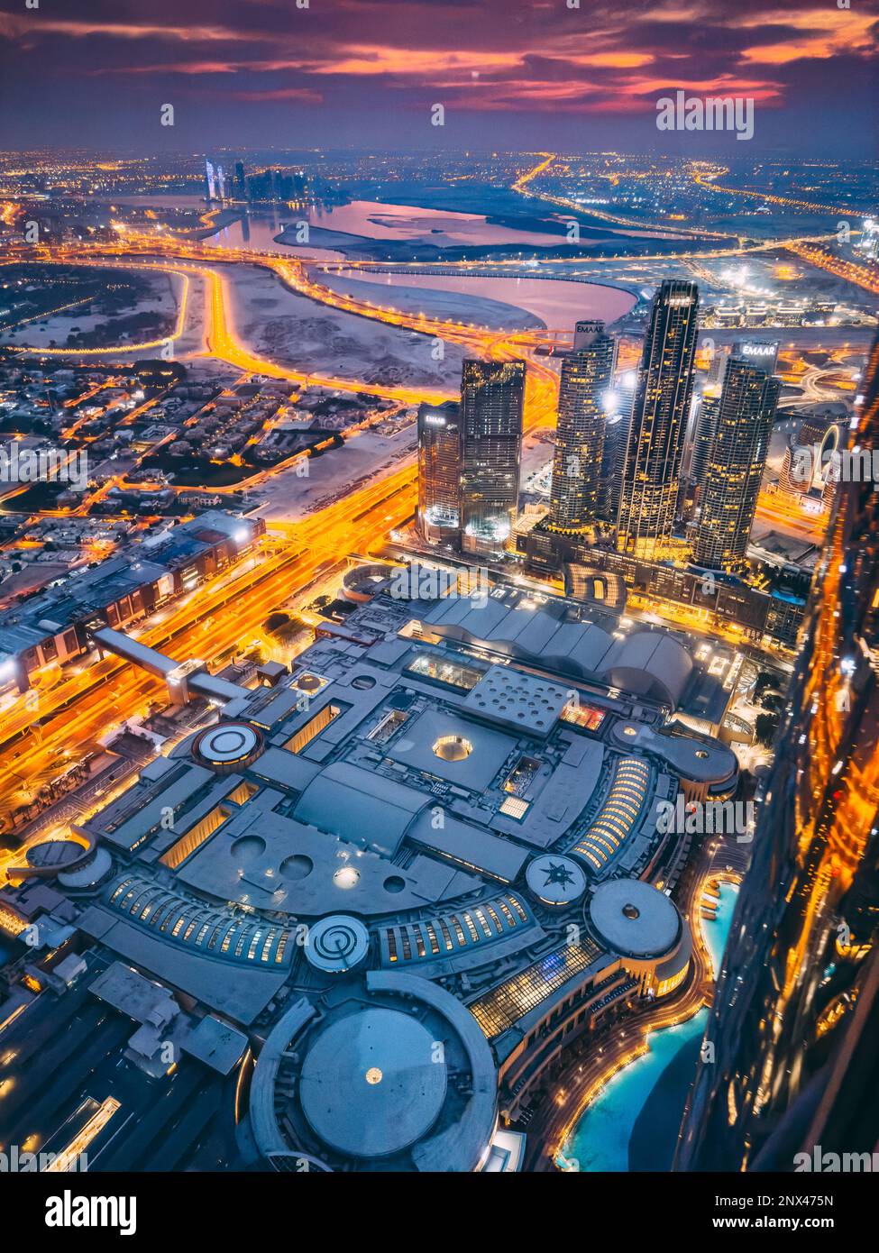 Aerial view of Downtown Dubai with roads, Dubai Mall and the fountain ...