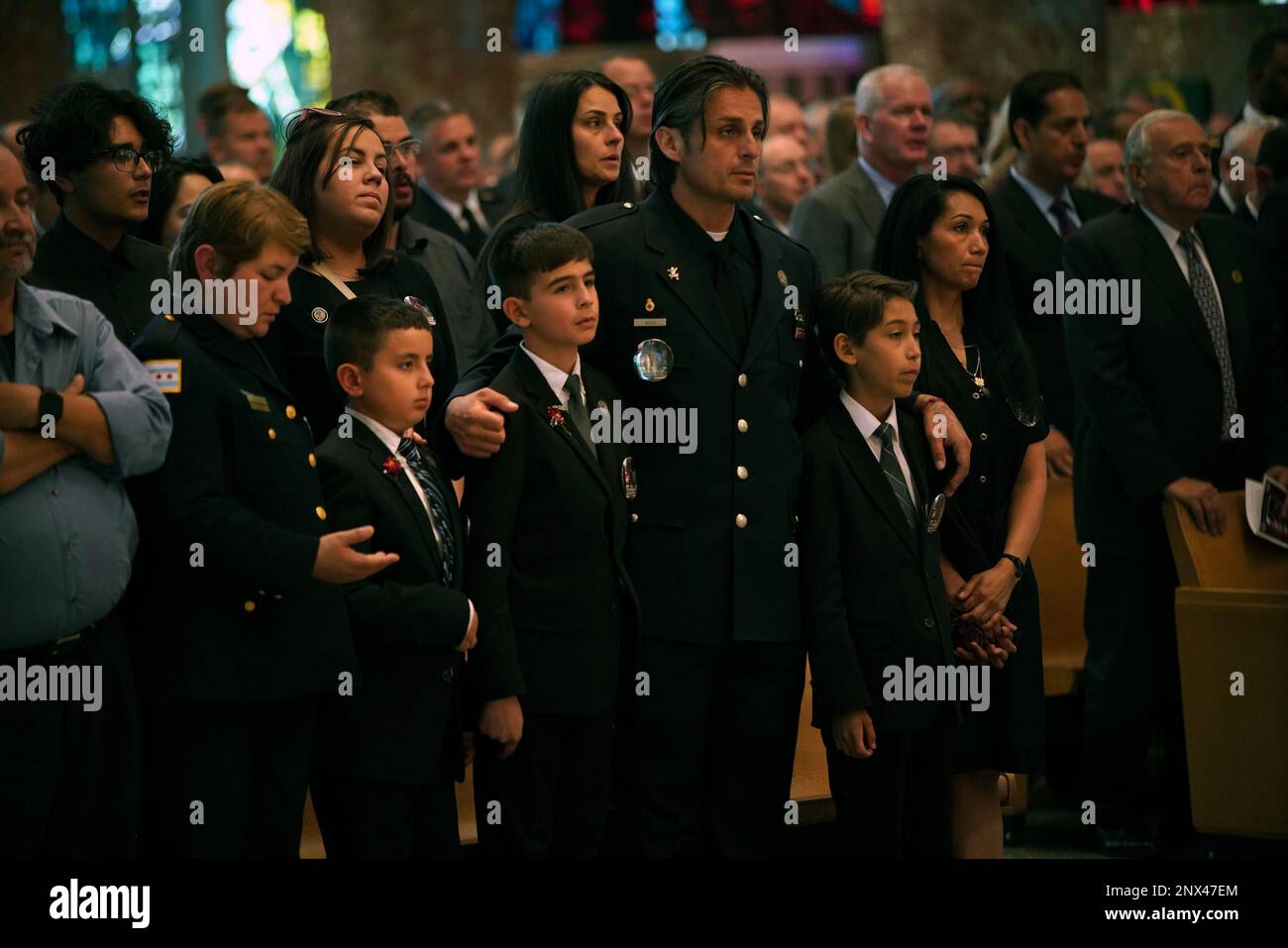 The family of fallen Chicago Fire Department diver Juan Bucio attend ...