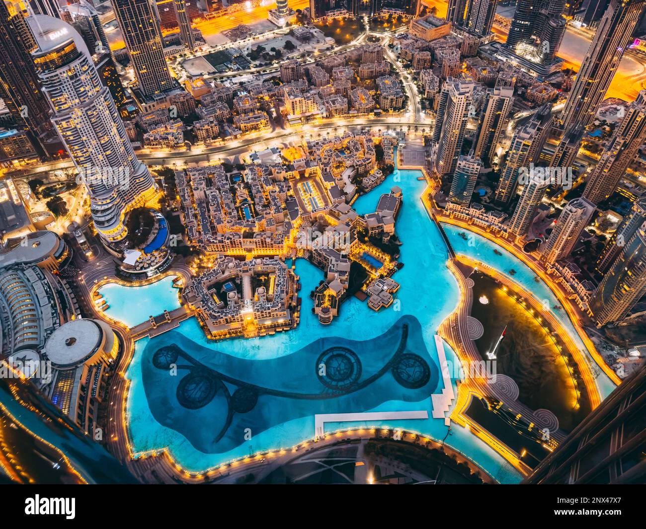 Aerial view of Downtown Dubai with roads, Dubai Mall and the fountain ...
