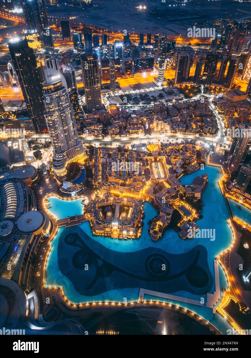 Aerial view of Downtown Dubai with roads, Dubai Mall and the fountain ...