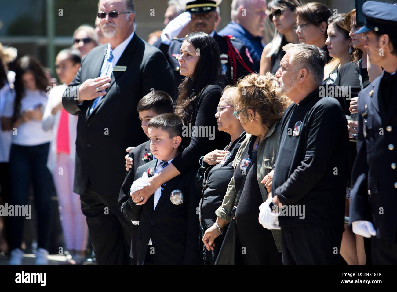 Juan Bucio's ex-wife Amy and his two sons Joshua and Jacob Bucio watch ...
