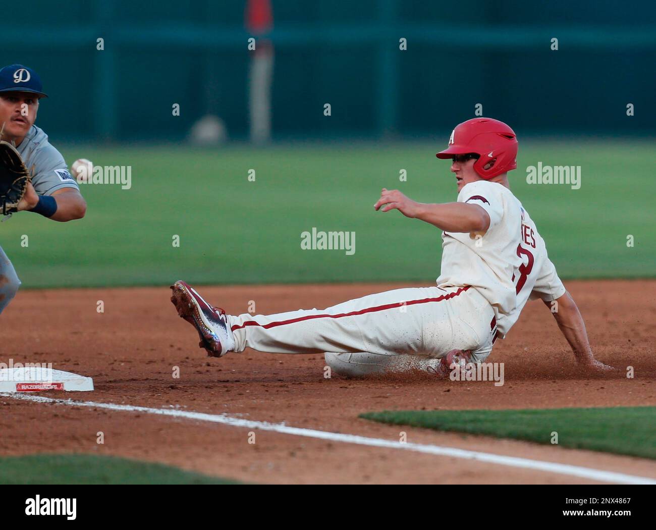 Jun 3, 2018: Arkansas first baseman Jared Gates #3 slides into third ...