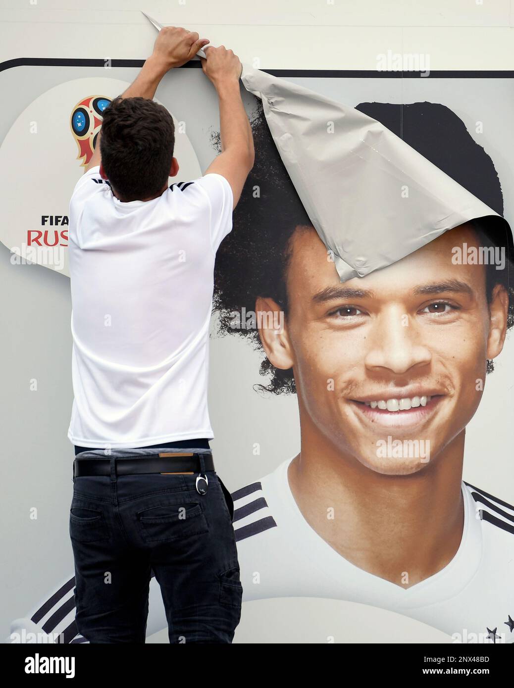 A picture showing German soccer player Leroy Sane is taken off the wall ...
