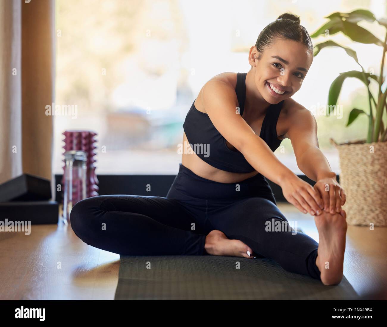 Yoga black woman, portrait and stretching leg with smile, peace and ...