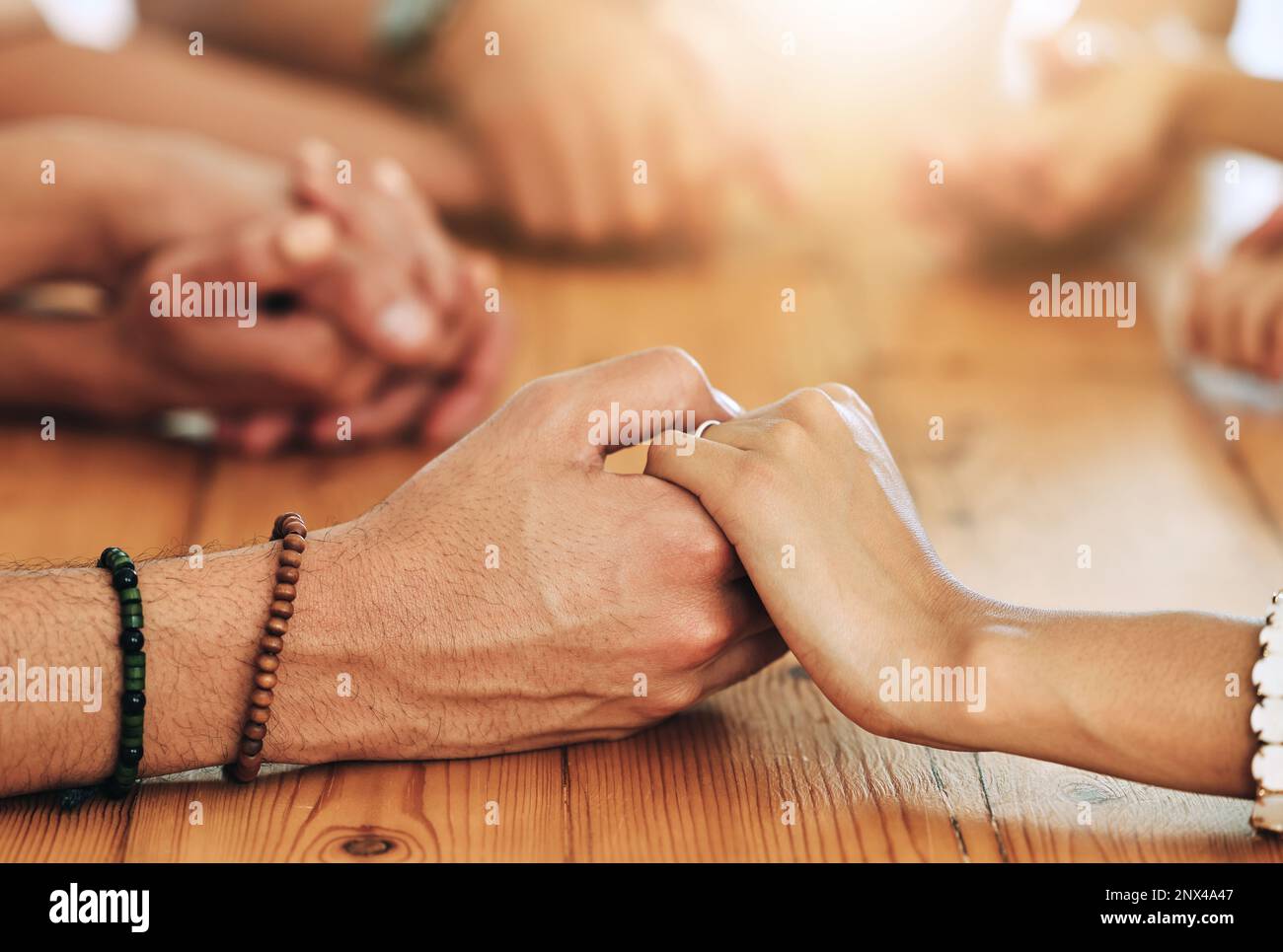 Holding hands, family and support by group of people together in unity ...