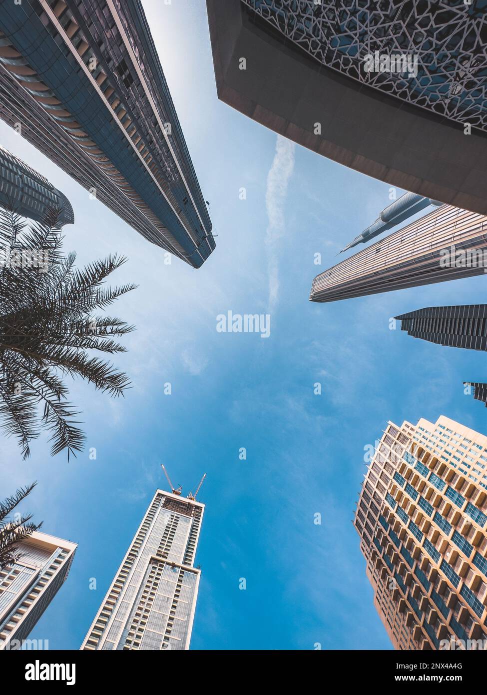 Dubai Opera house in Downtown Dubai, surrounded by skyscrapers and Burj ...