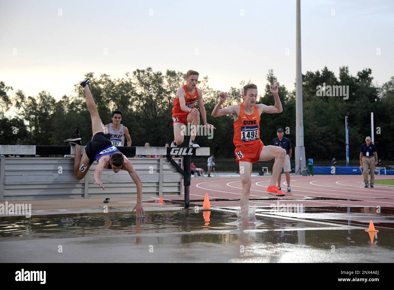 Furman's Troy Redder (494) flips into the water after missing a hurdle ...