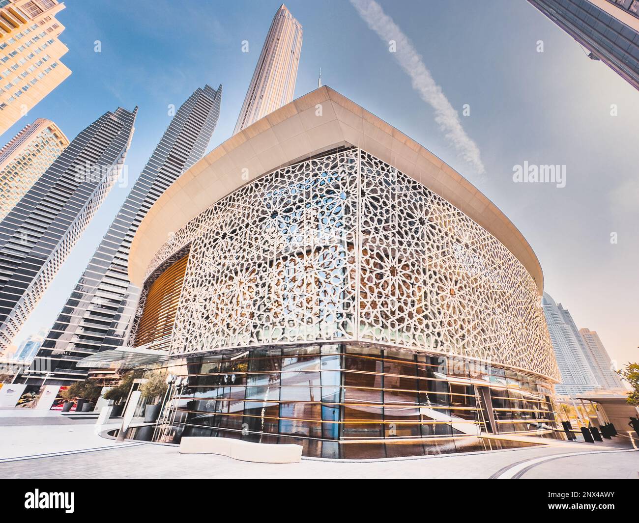 Dubai Opera house in Downtown Dubai, surrounded by skyscrapers and Burj ...