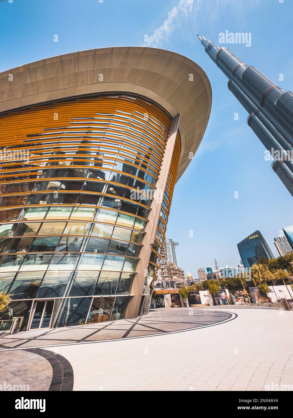 Dubai Opera house in Downtown Dubai, surrounded by skyscrapers and Burj ...