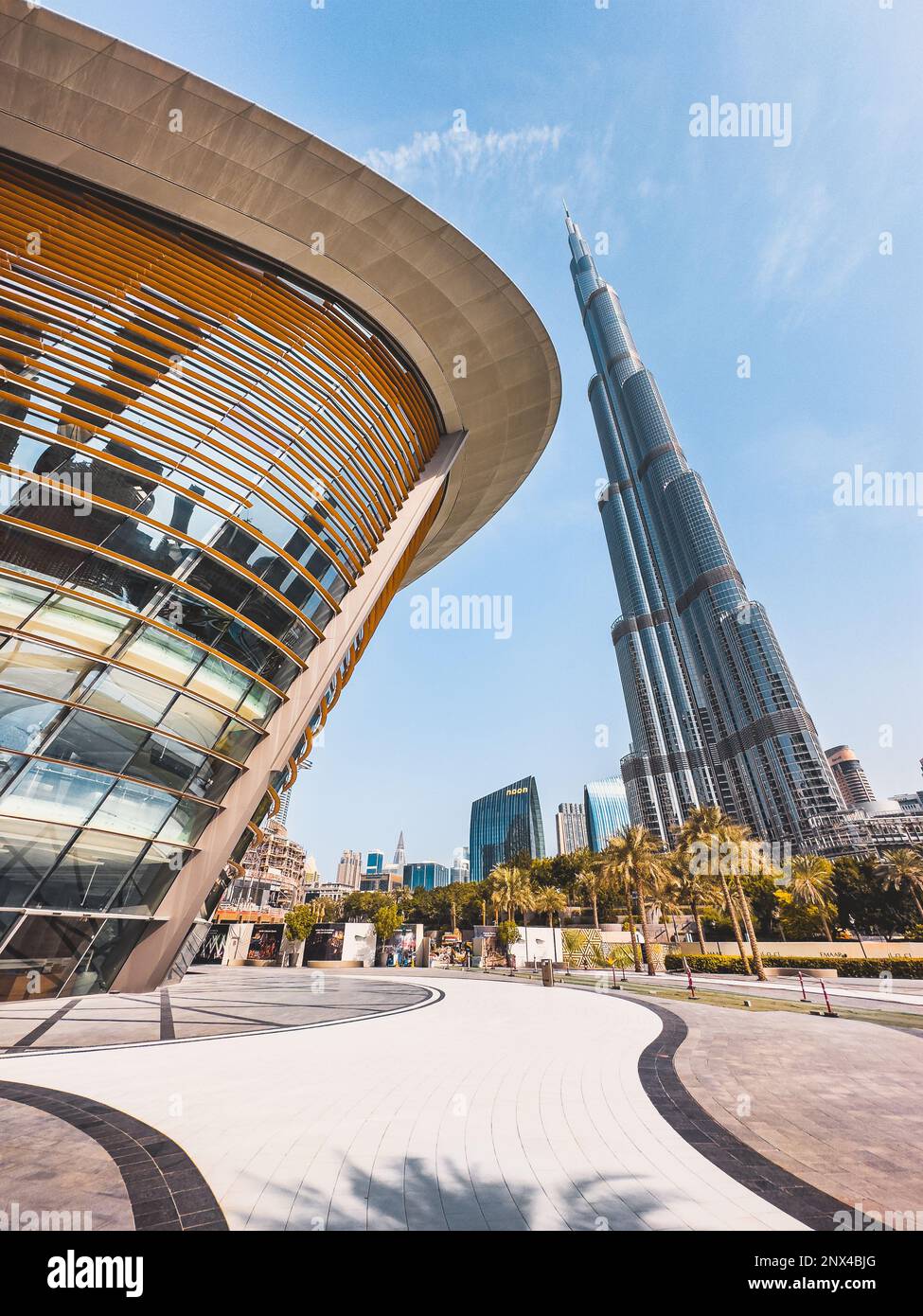 Dubai Opera house in Downtown Dubai, surrounded by skyscrapers and Burj ...