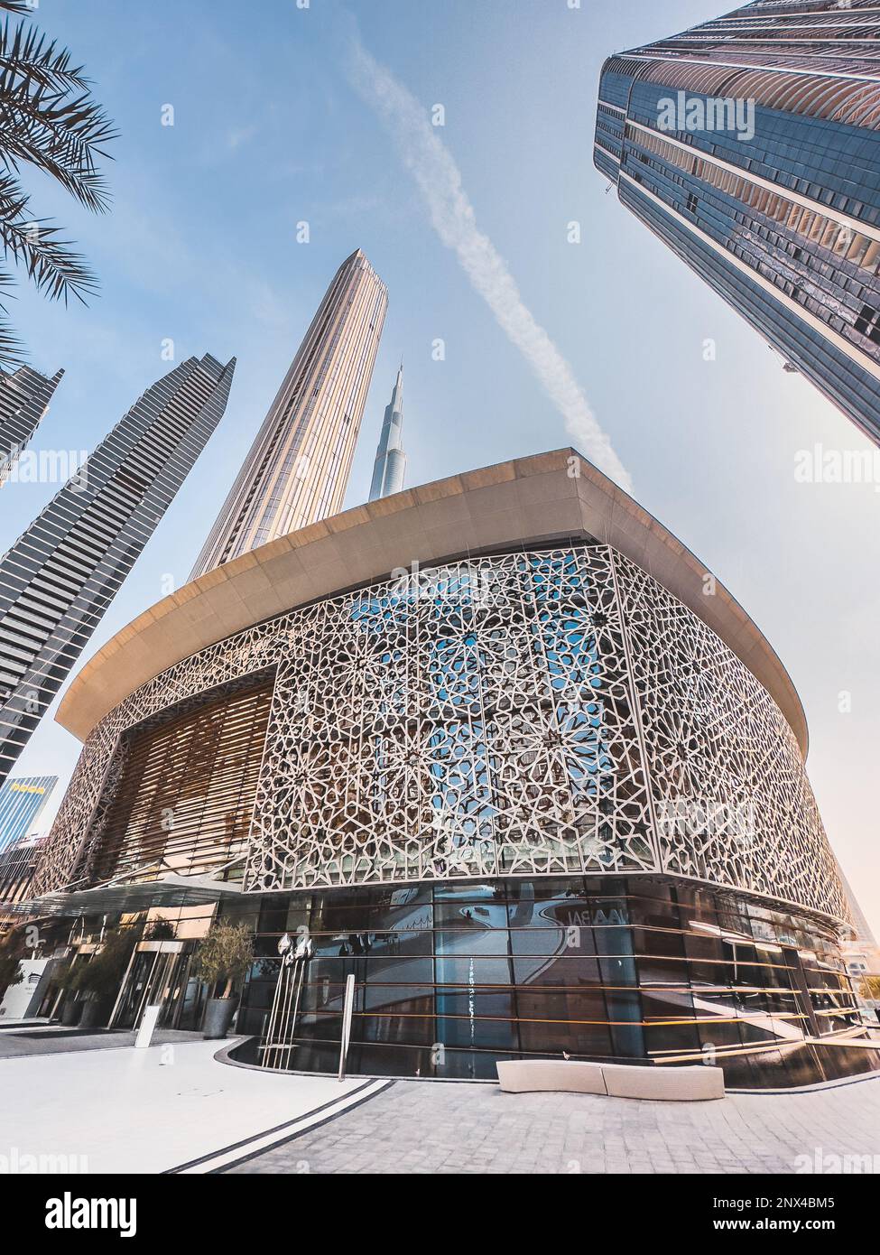 Dubai Opera house in Downtown Dubai, surrounded by skyscrapers and Burj ...