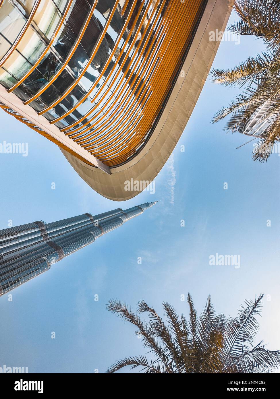 Dubai Opera house in Downtown Dubai, surrounded by skyscrapers and Burj ...