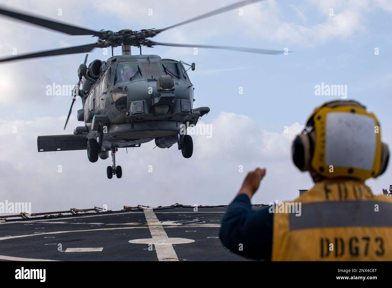 230111-N-SN516-1036 PHILIPPINE SEA (Jan. 11, 2023) An MH-60R Sea Hawk ...