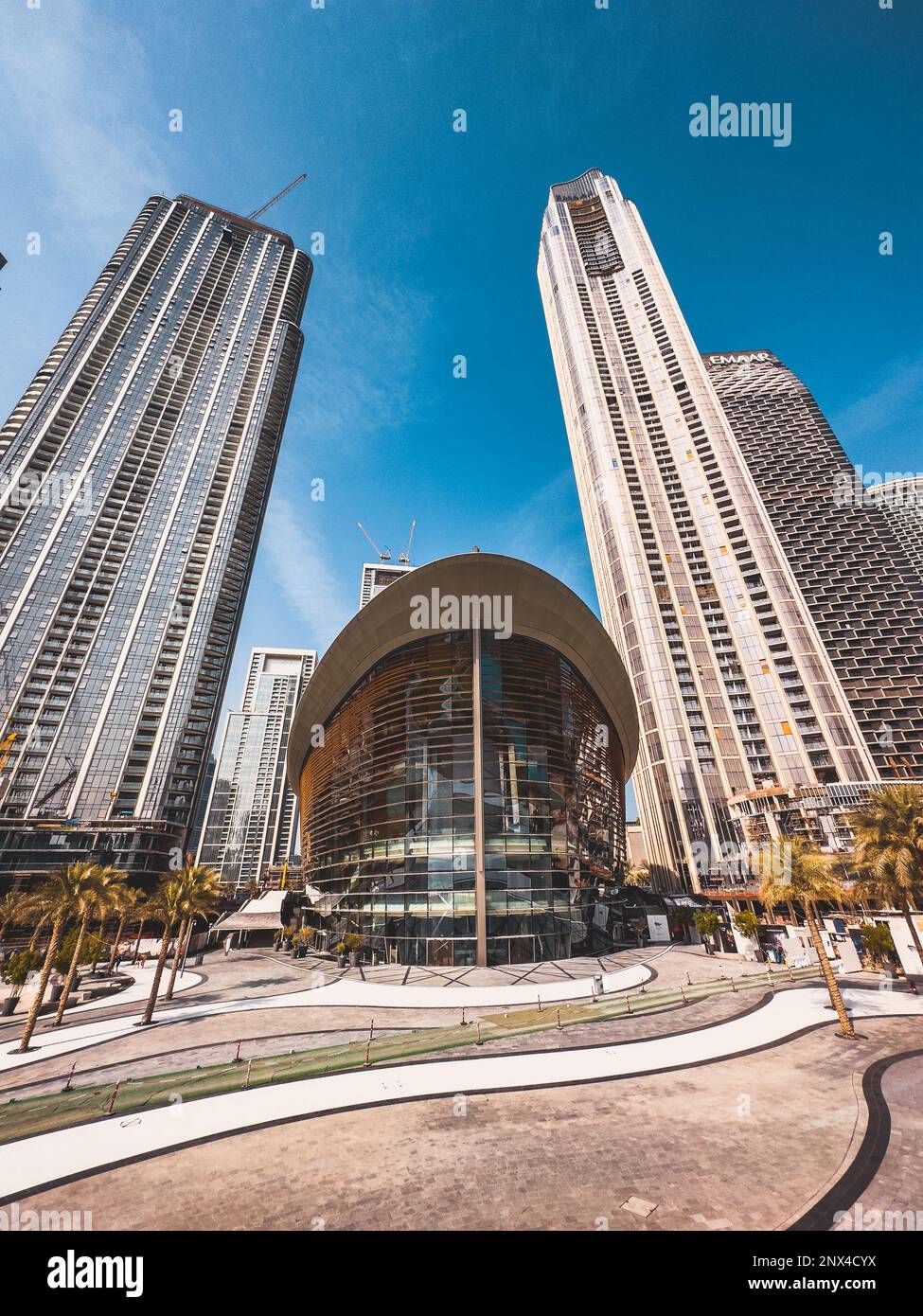Dubai Opera house in Downtown Dubai, surrounded by skyscrapers and Burj ...
