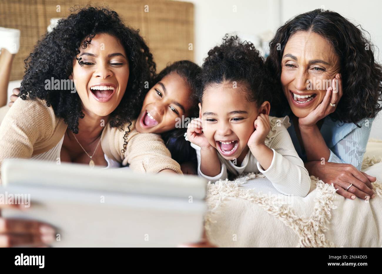 Smile, selfie and tablet with family in bedroom for relax, social media ...