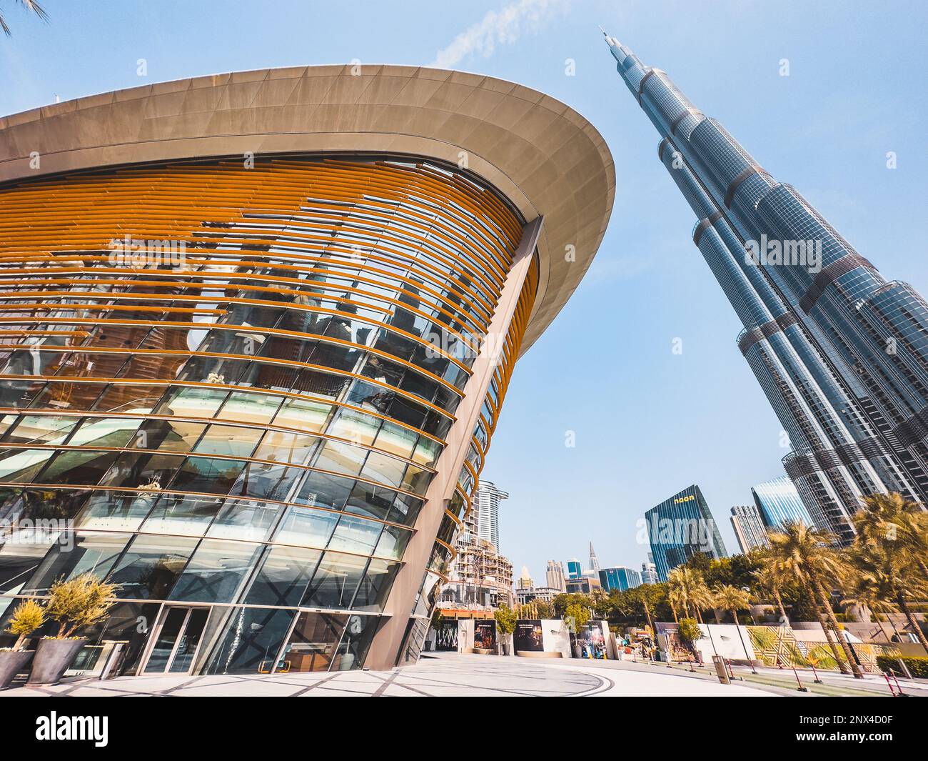 Dubai Opera house in Downtown Dubai, surrounded by skyscrapers and Burj ...