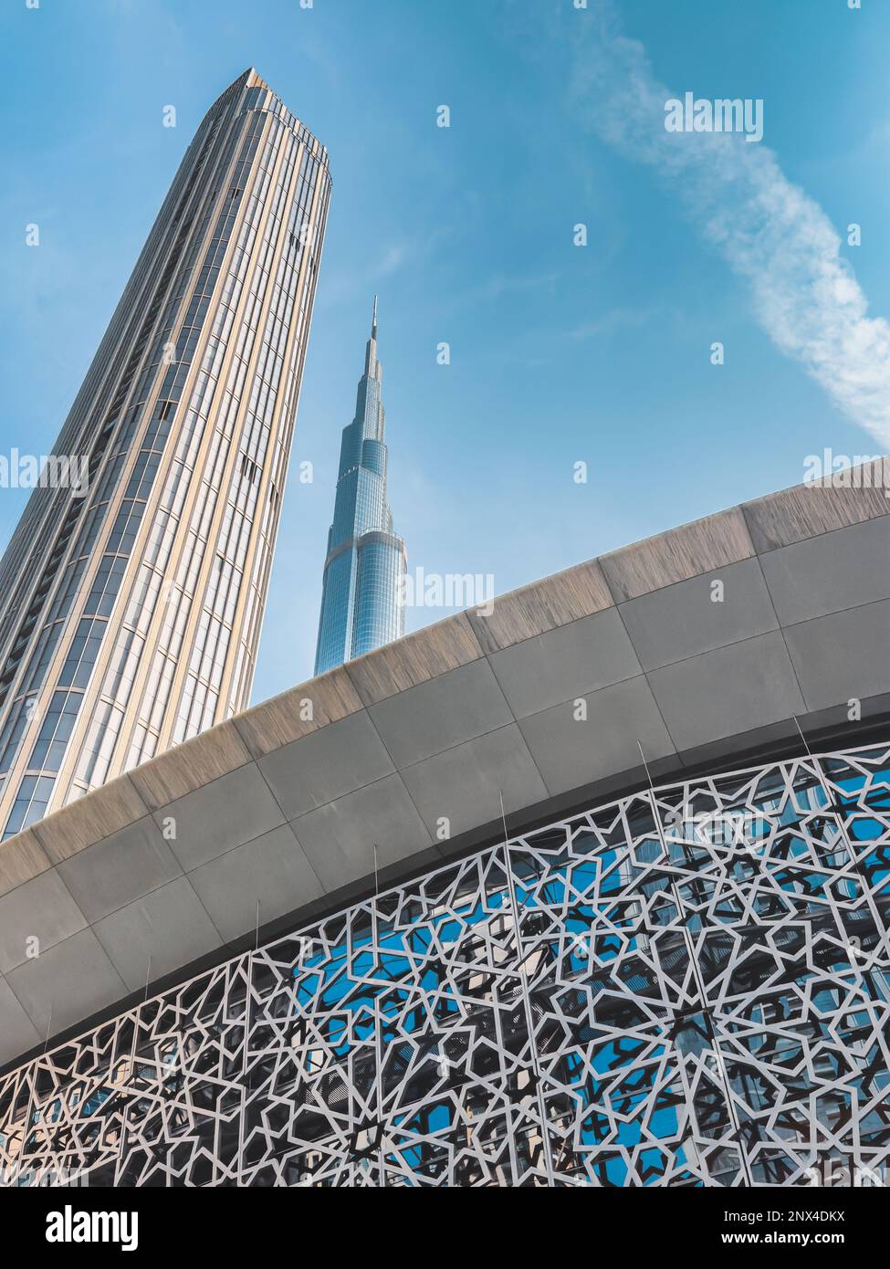 Dubai Opera house in Downtown Dubai, surrounded by skyscrapers and Burj ...