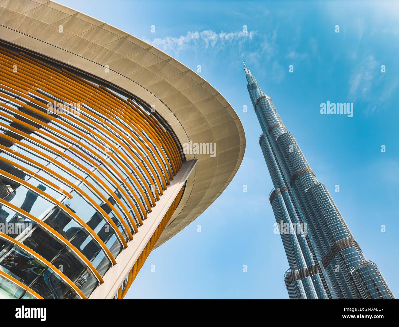 Dubai Opera house in Downtown Dubai, surrounded by skyscrapers and Burj ...