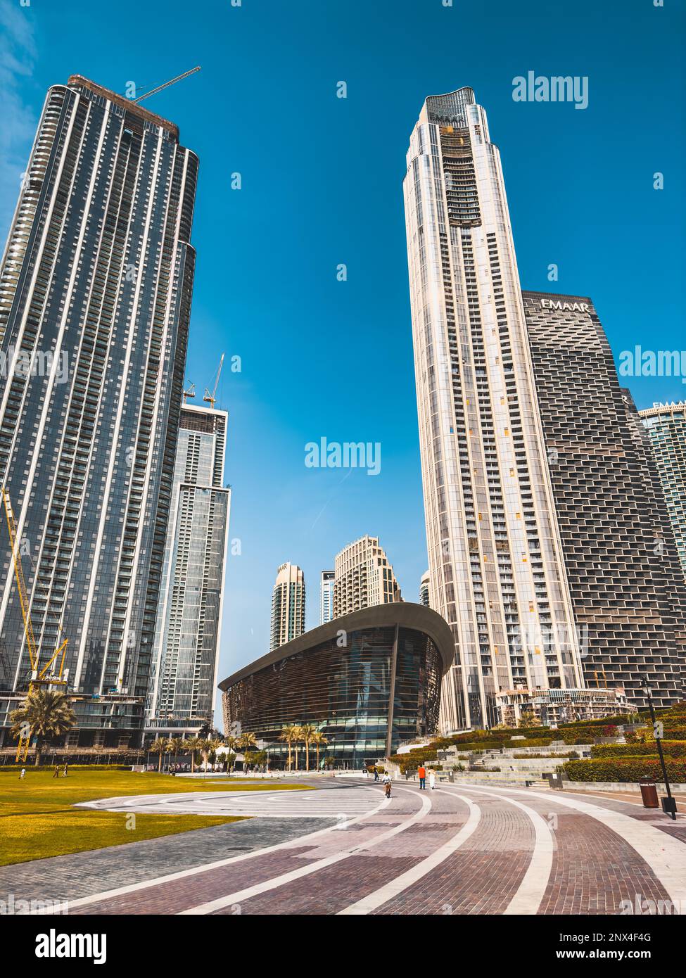 Dubai Opera house in Downtown Dubai, surrounded by skyscrapers and Burj ...