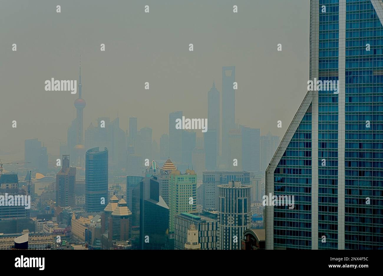 China.Shanghai: Skyline. At left Oriental Pearl Tower. At righ Jin Mao ...