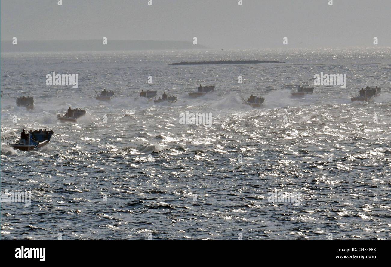 Fishing boats head for Kaigara Jima Island of Habomai Islands in Nemuro ...
