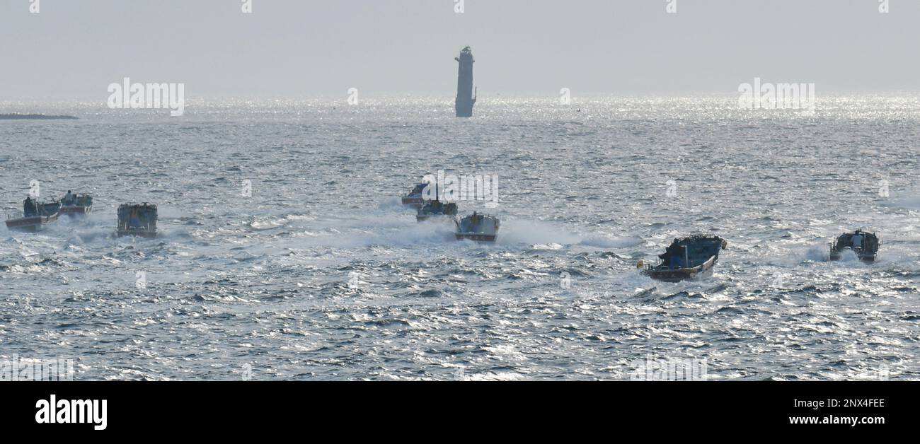 Fishing boats head for Kaigara Jima Island of Habomai Islands in Nemuro ...