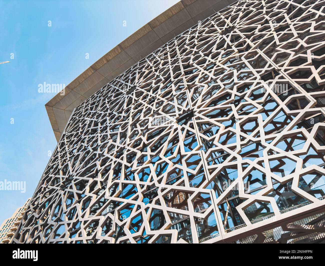 Dubai Opera house in Downtown Dubai, surrounded by skyscrapers and Burj ...
