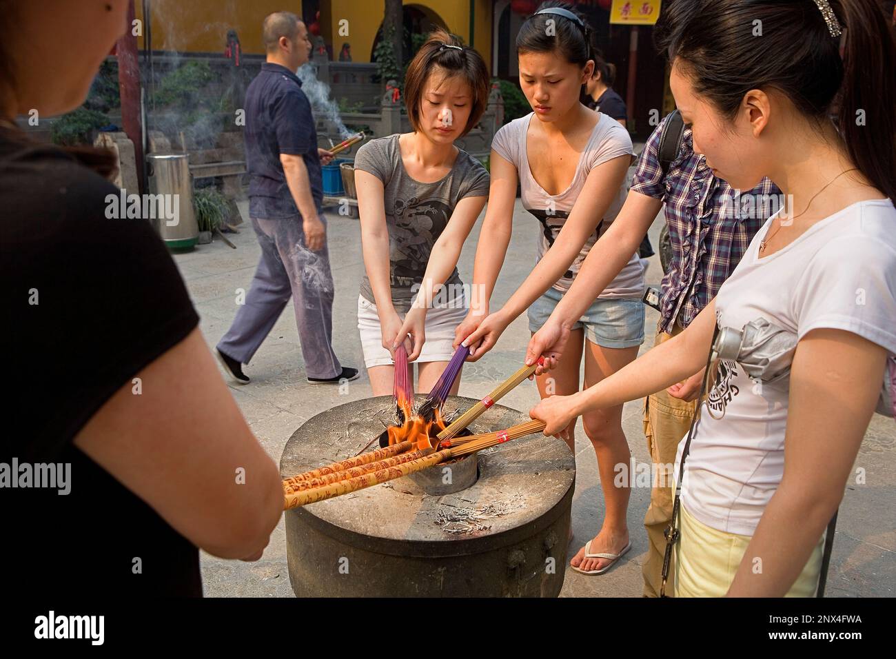 Burning incense jade buddha hi-res stock photography and images - Alamy