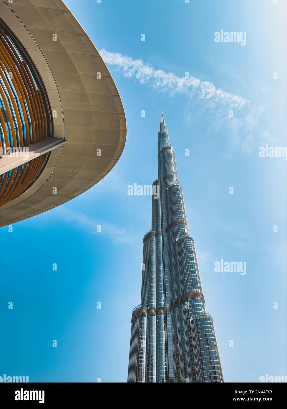 Dubai Opera house in Downtown Dubai, surrounded by skyscrapers and Burj ...