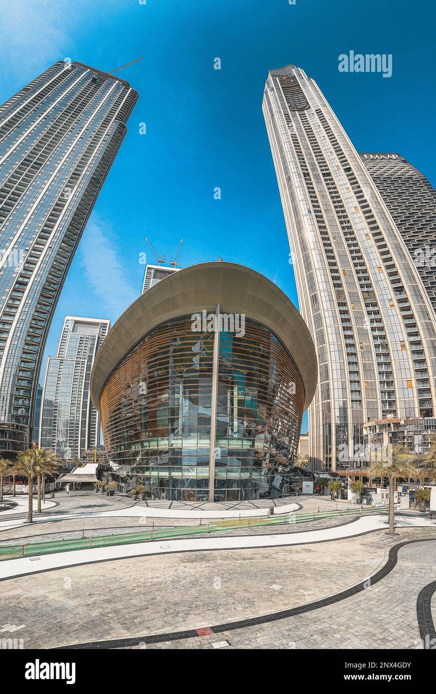 Dubai Opera house in Downtown Dubai, surrounded by skyscrapers and Burj ...