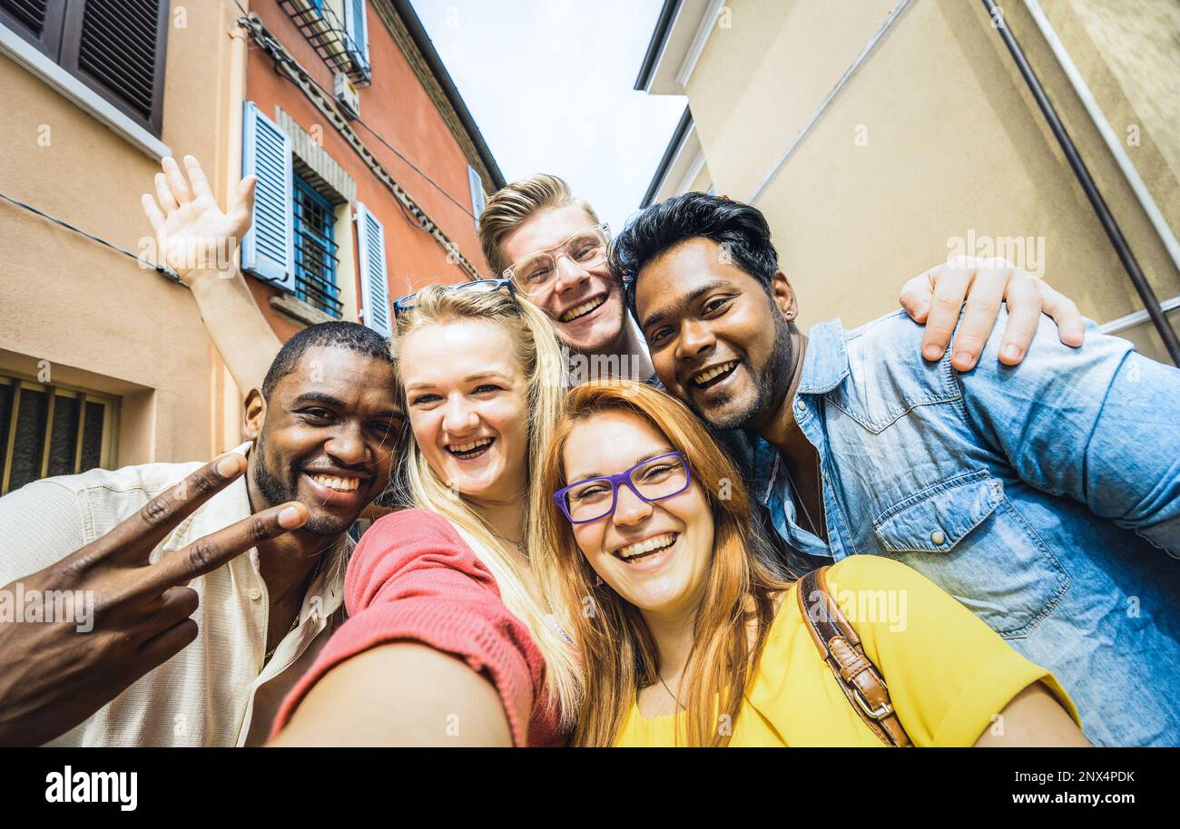 Best friends multiracial people taking selfie outdoors - Happy ...