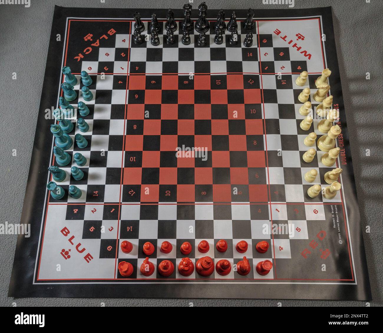 four person chess set all ready for a game Stock Photo - Alamy