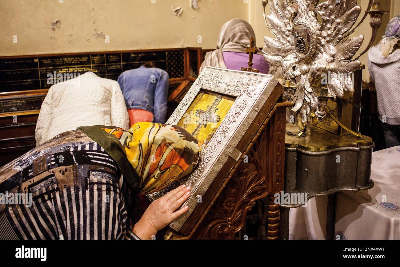Woman praying, Chapel of the relics,in Church of the Holy Sepulchre ...