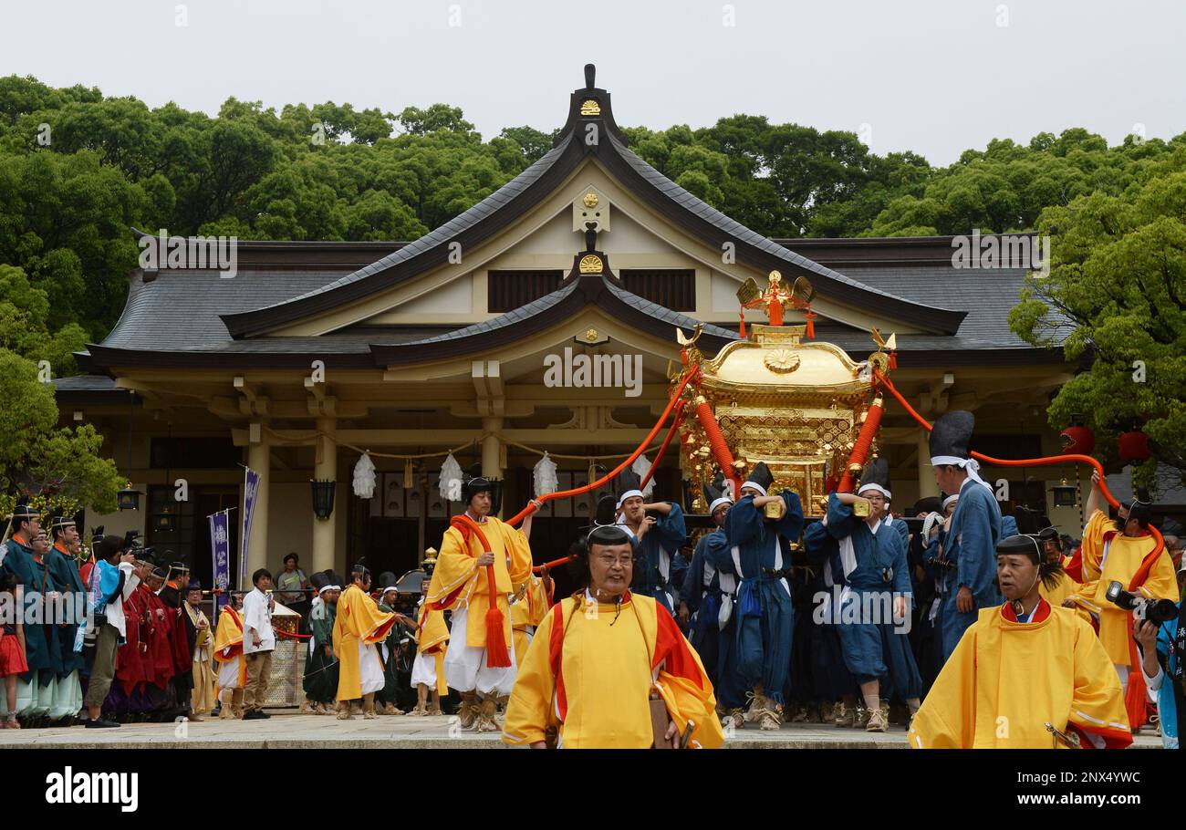 A Mikoshi, a portable shrine, leaves Minatogawa Shrine that enshrines ...