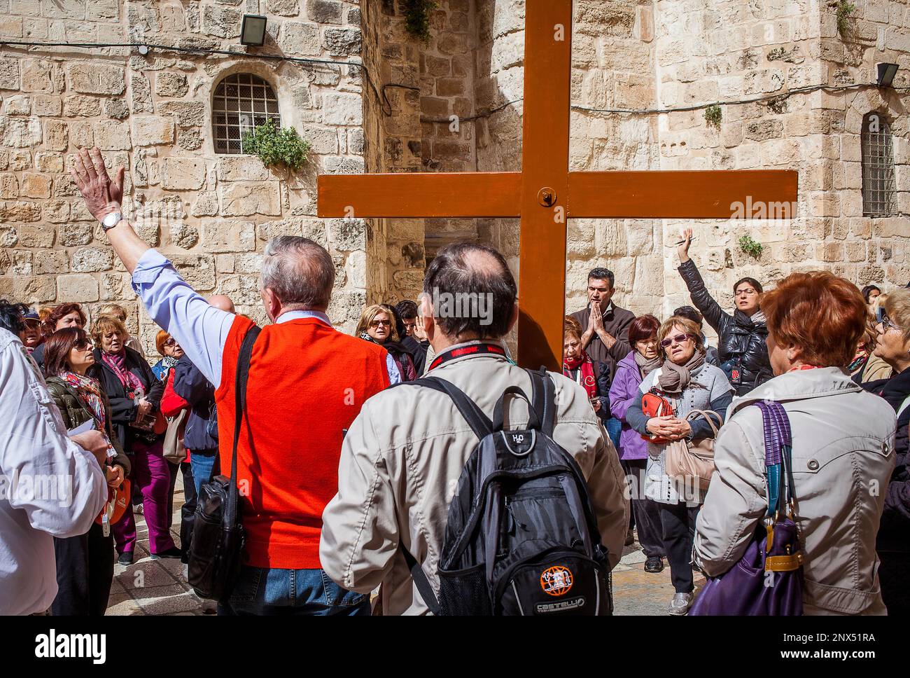Pilgrims following Jesus' steps on the Via Dolorosa, in exterior of ...